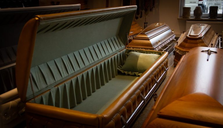 Understanding Half-Couch versus Full-Couch Caskets - Funeral Basics